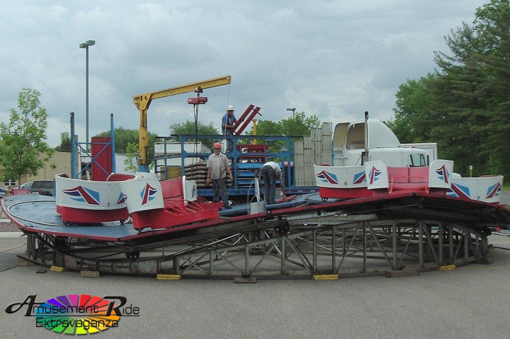 Pieces being placed on the track via the truck-mounted crane ...